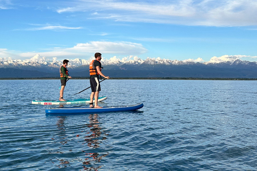 Sunset SUP on Lake Issyk Kul Evening tour – Travel Service Team